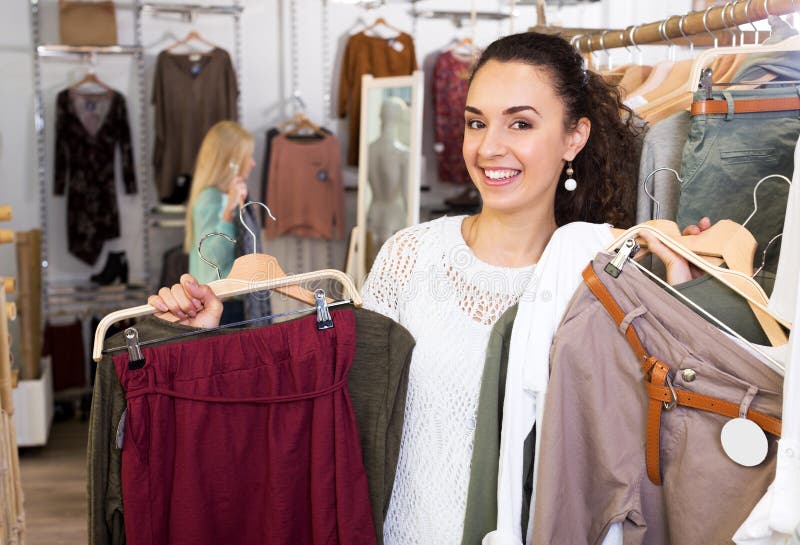 Cheerful Female Customer Selecting New Garments Stock Image Image Of
