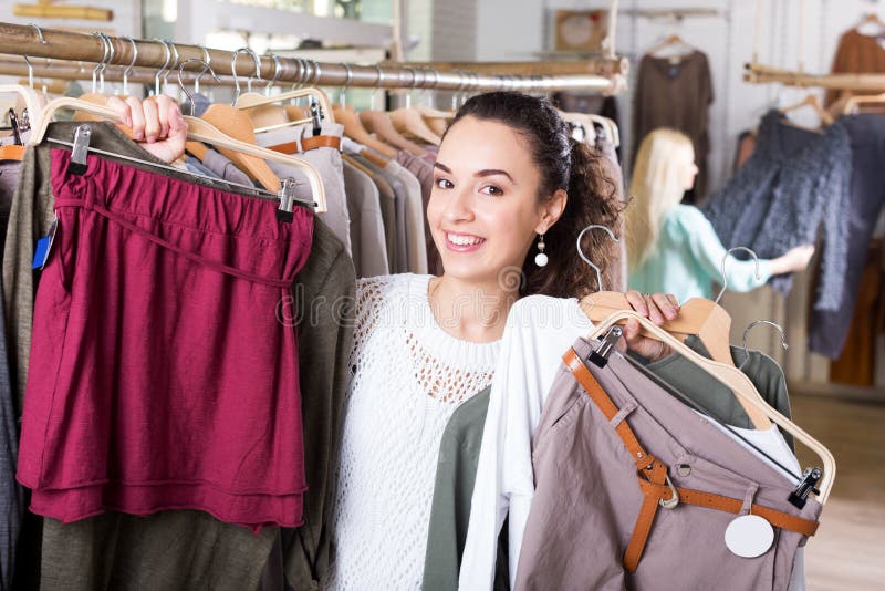 Cheerful Female Customer Selecting New Garments Stock Image Image Of