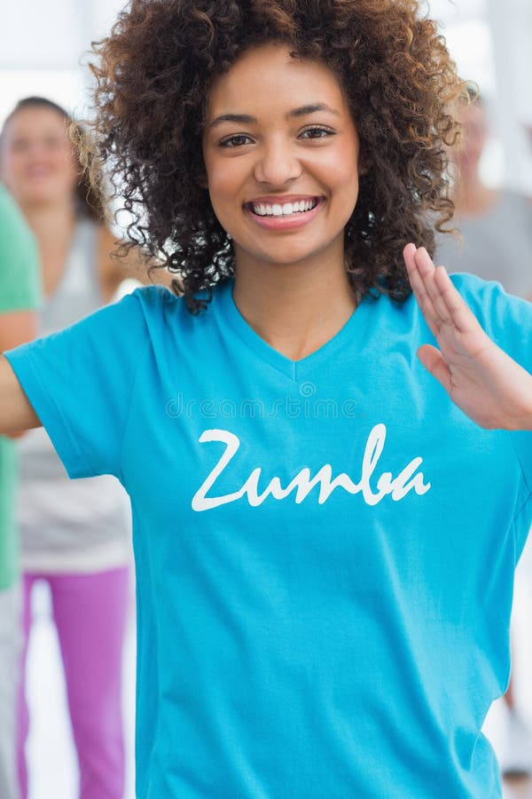 Cheerful Female Instructor Doing Pilates Exercise Stock Photo - Image ...