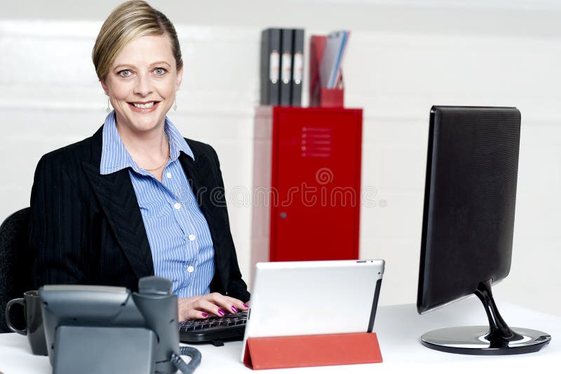 Cheerful Female Secretary Typing Document Stock Image - Image of ...