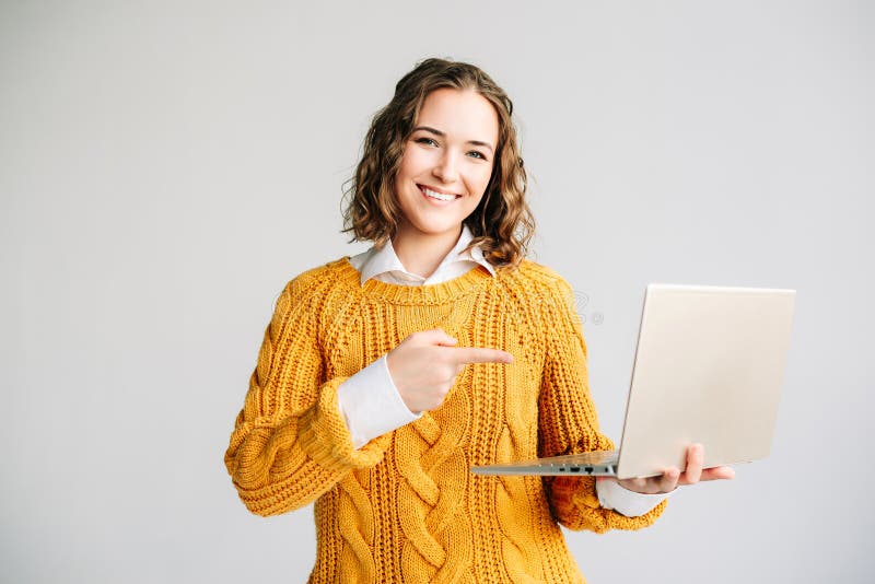 Young Woman Presenting E-Learning on Laptop. Cheerful Female Student ...