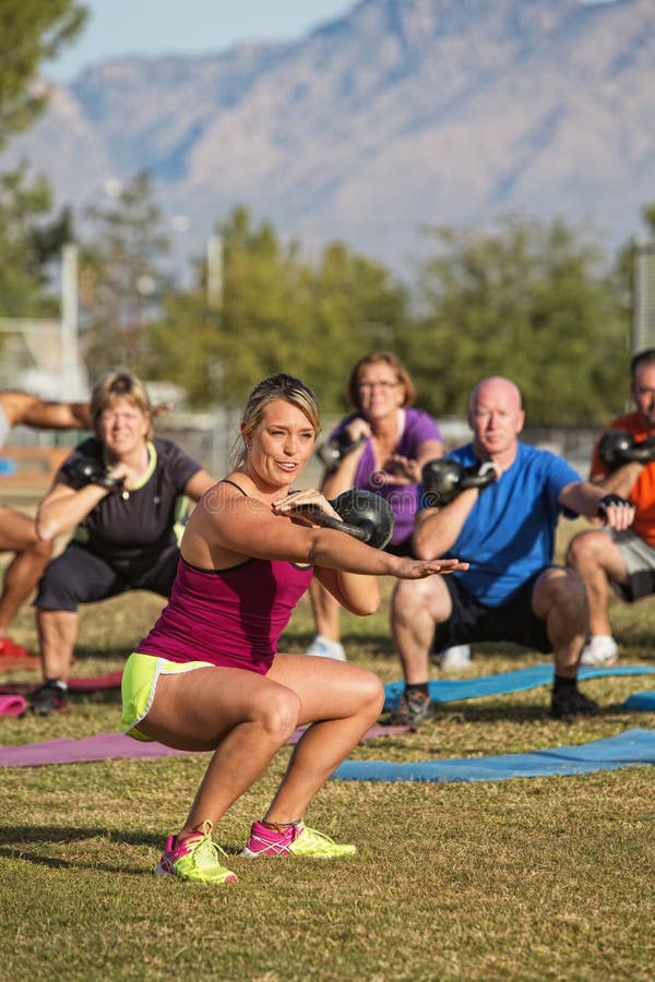 Cheerful Fitness Instructor with Class Stock Photo - Image of fitness ...
