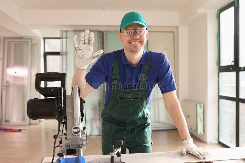 Cheerful Foreman in Uniform Shows Hello Looking in Camera Stock Image ...