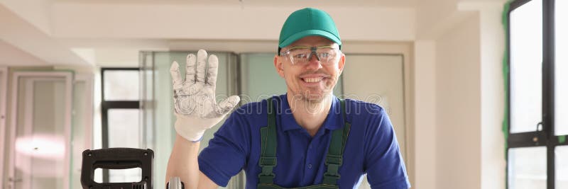 Cheerful Foreman in Uniform Shows Hello Looking in Camera Stock Photo ...