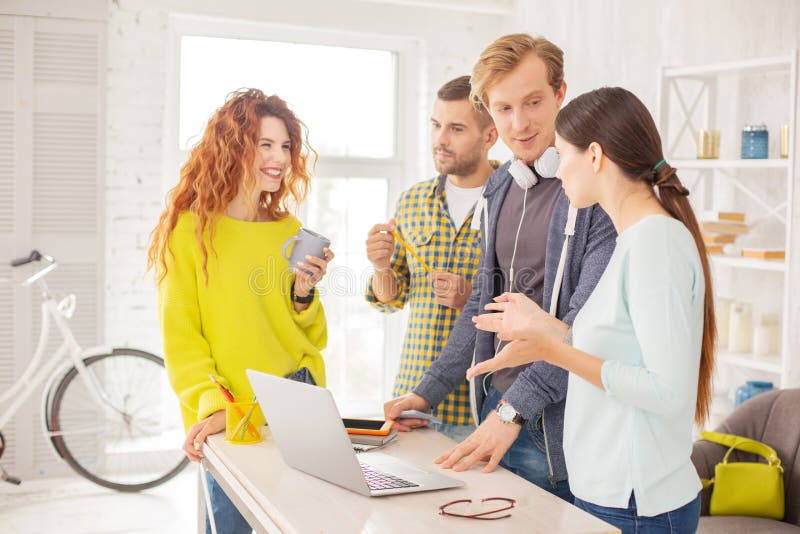 Cheerful Four Colleagues Cooperating Stock Image - Image of brainstorm ...
