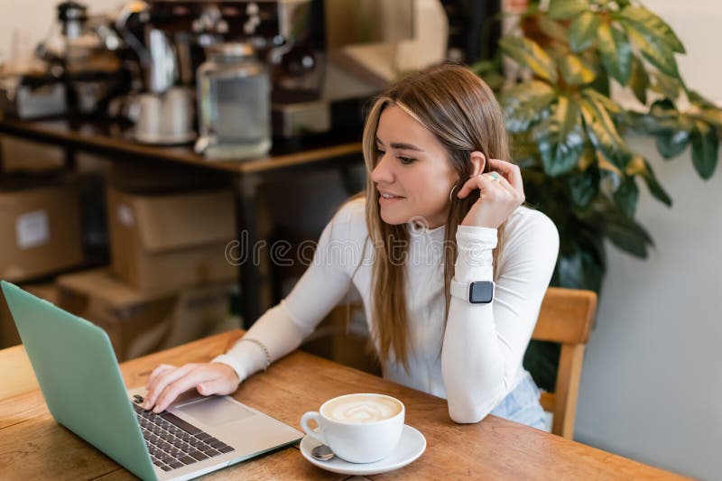 Cheerful Freelancer Using Laptop Next To Stock Image - Image of tourism ...
