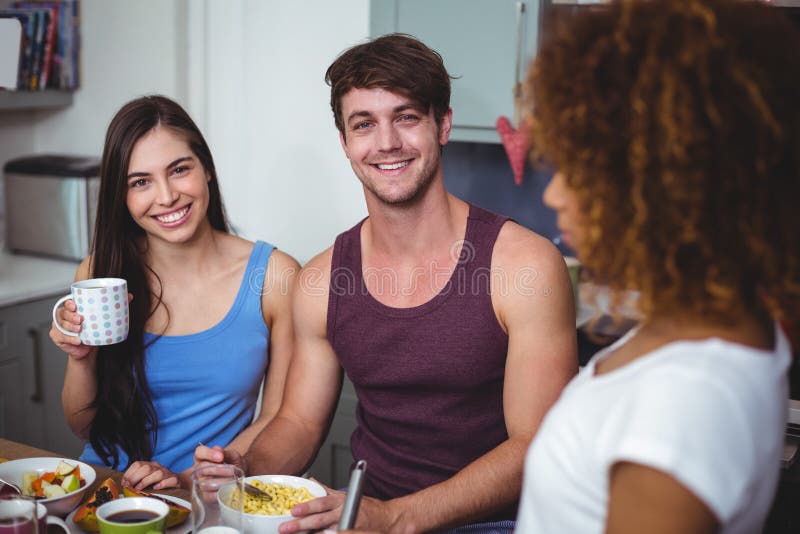 Cheerful Friends Having Breakfast Stock Photo - Image of companionship ...