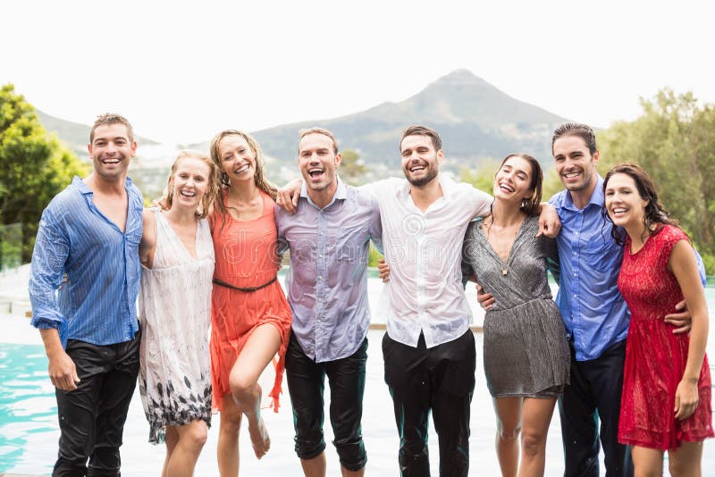 Cheerful Friends Standing by Swimming Pool Stock Image - Image of ...