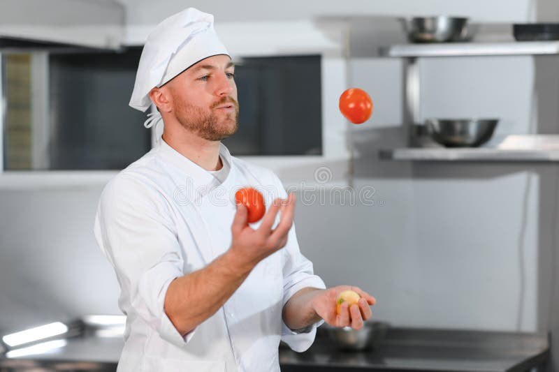 Cheerful and Funny Male Chef Juggling Vegetables in Restaurant Kitchen ...