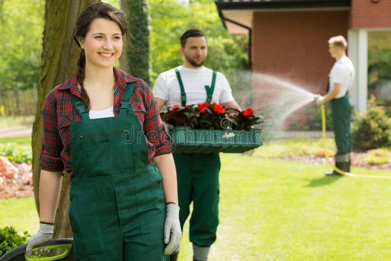 Cheerful Gardener Enjoying Work in Garden Stock Image - Image of plant ...