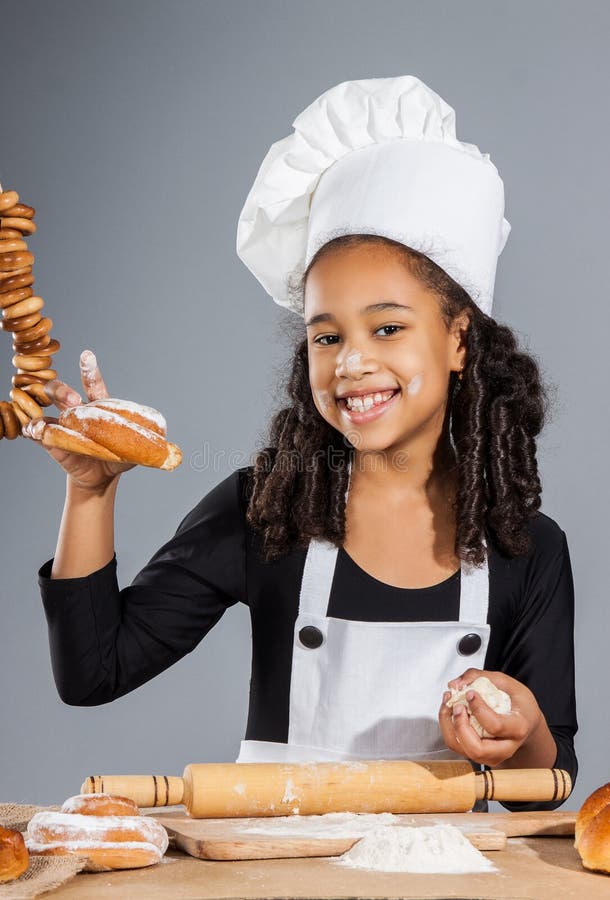 Cheerful girl chef stock image. Image of gesture, cake - 49958421