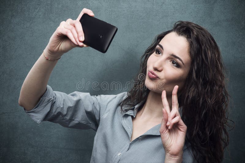 Cheerful Girl Taking a Selfie Stock Image - Image of photographing ...