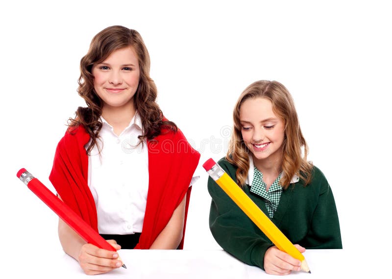 Girls Writing on Blackboard in Classroom Stock Photo - Image of chalk ...