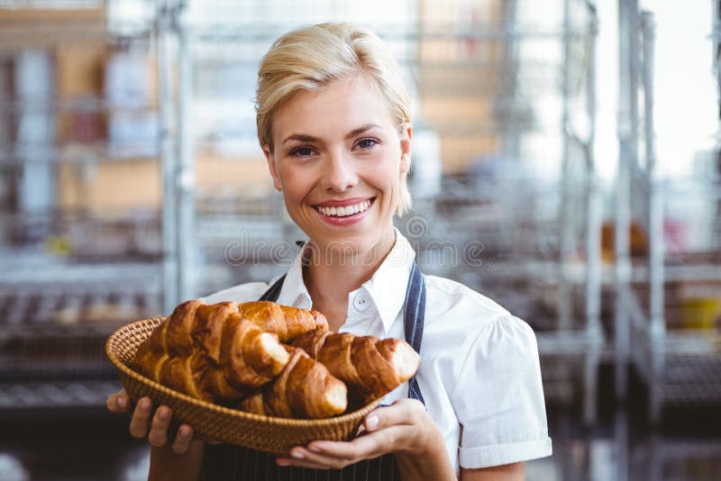 Cheerful Gorgeous Waitress Holding a Basket with Croissant Stock Image ...