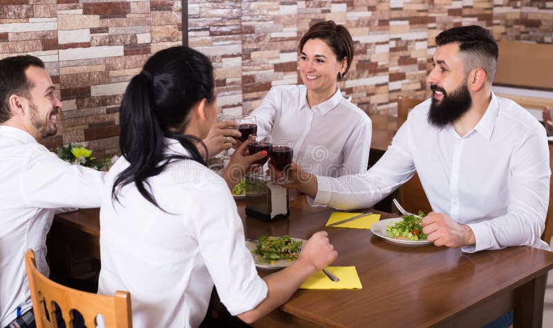 Cheerful Group of Friends at Restaurant Table Stock Image - Image of ...