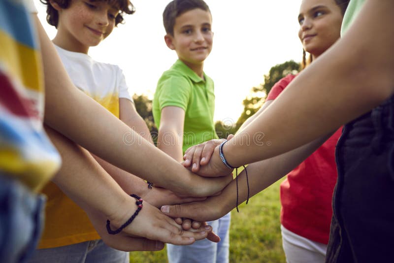 Cheerful Group of Kids Friends Making Stack of Hands Having Fun and ...