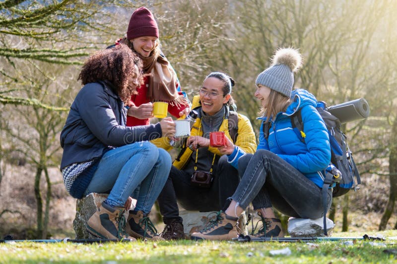 Cheerful Group of Young Hikers Take Breakfast on the Mountain Stock ...