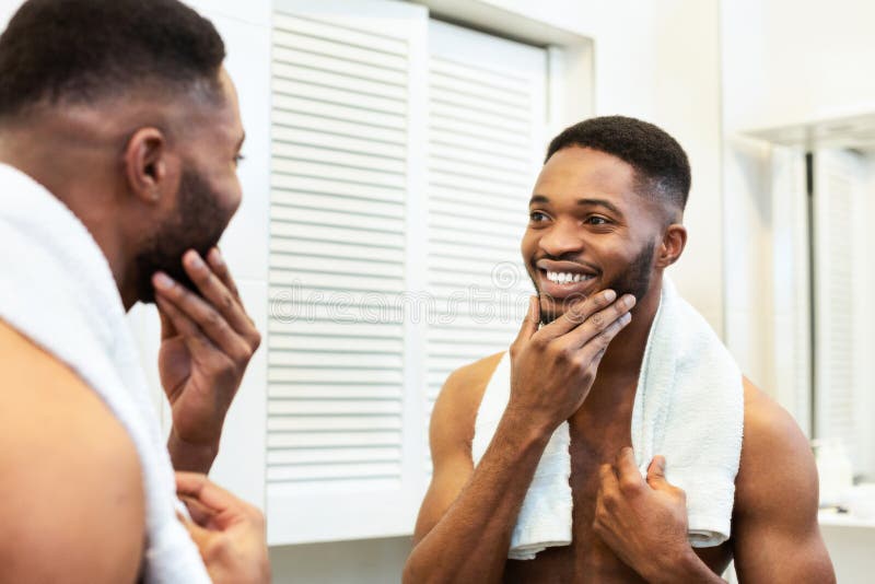 Cheerful Guy Looking at Mirror, Enjoying His Reflection Stock Image ...