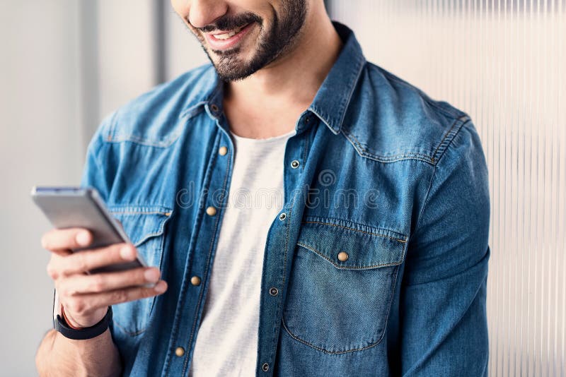 Cheerful Guy Messaging on Phone Stock Image - Image of caucasian, male ...