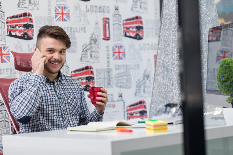 Cheerful Guy Sitting in Front of Desktop Computer Stock Photo - Image ...