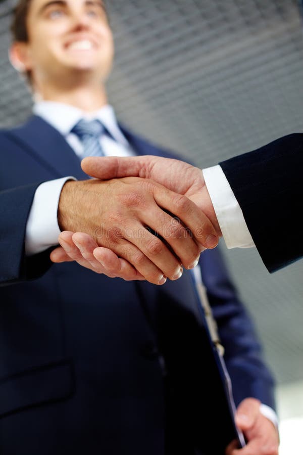 Cheerful handshaking stock image. Image of agreement - 26269349