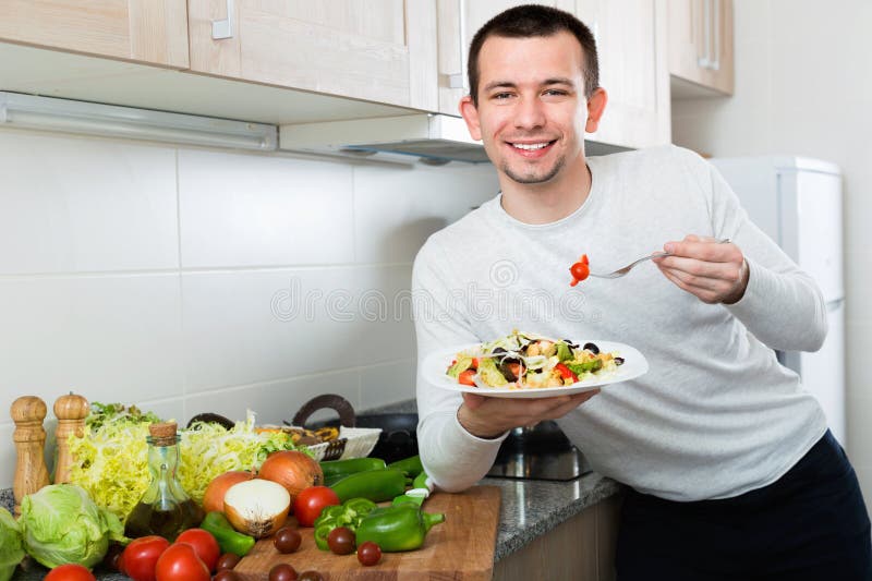 Cheerful Handsome Man Holding Plate Stock Image - Image of leisure ...