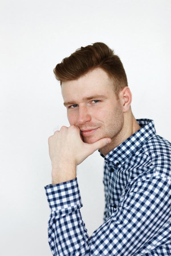 Cheerful Handsome Redhead Young Man In Black Cardigan Checkered Shirt