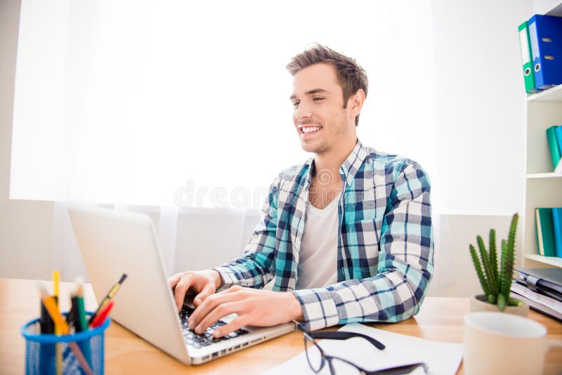 Cheerful Happy Man Doing Task and Writing on Laptop Stock Photo - Image ...