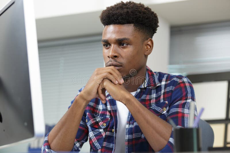 Cheerful Happy Man Doing Task and Writing on Laptop Stock Photo - Image ...