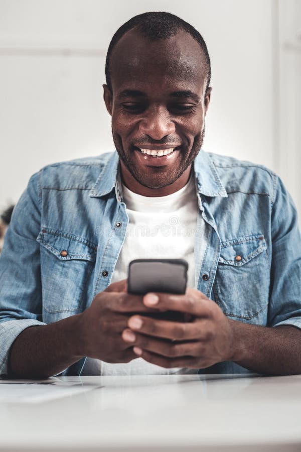 Cheerful Happy Man Looking at the Smartphone Screen Stock Image - Image ...