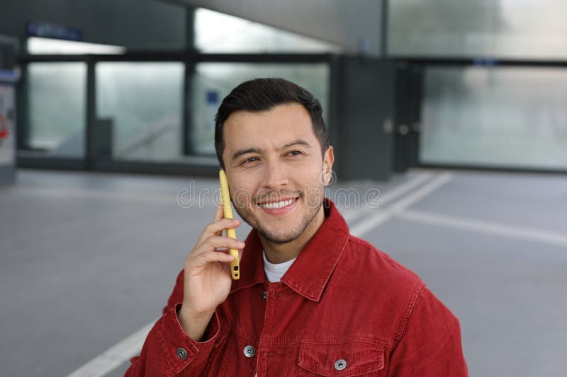 Cheerful Hispanic Young Man on the Phone Stock Photo - Image of male ...