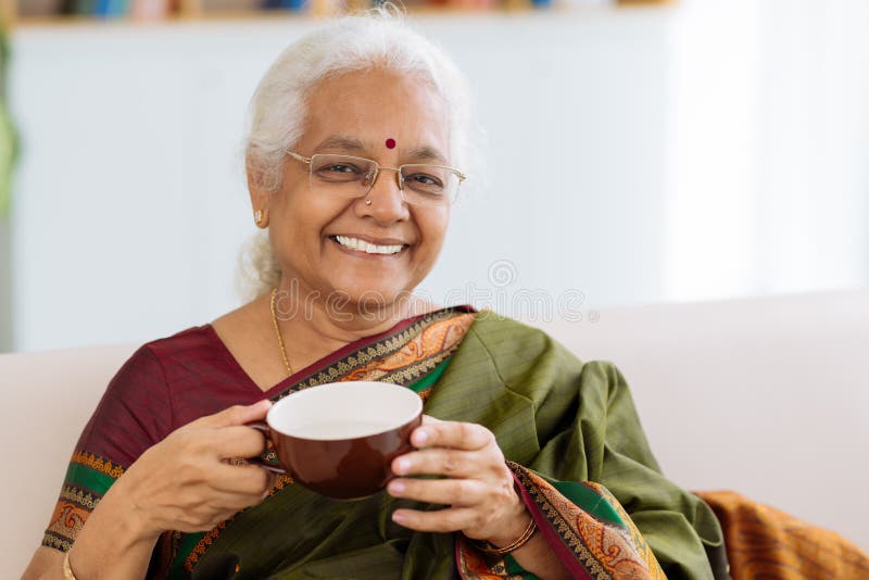 Cheerful Indian lady stock photo. Image of grandmother - 48304522