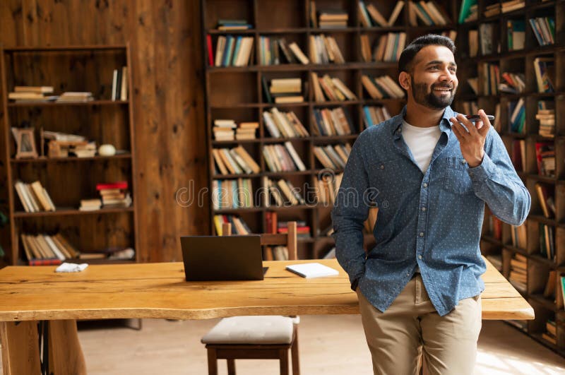 Cheerful Indian Man Using Convert Voice into Text Mobile App Stock ... Cheerful Indian Man Using Convert Voice into Text Mobile App Stock ...