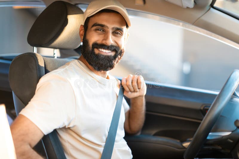 Cheerful Indian Young Man Sitting in Driver Seat in Car Stock Image ... Cheerful Indian Young Man Sitting in Driver Seat in Car Stock Image ...