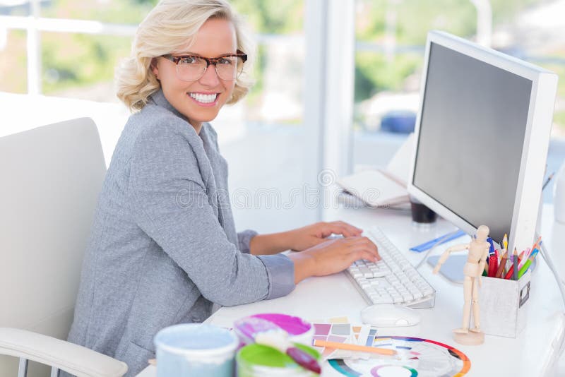 Cheerful Interior Designer Working on Her Computer Stock Photo - Image ...