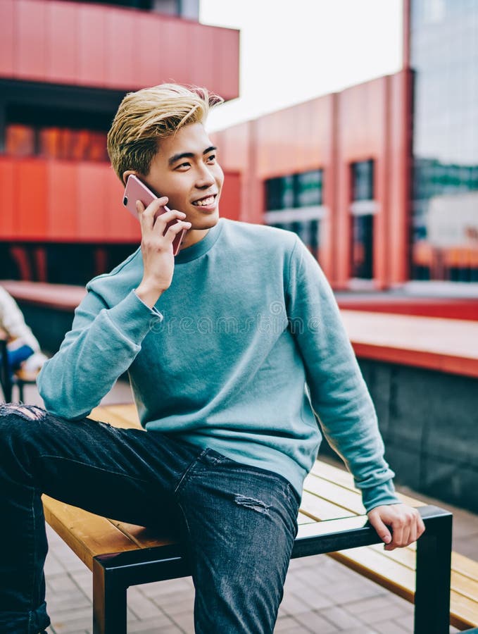 Cheerful Japanese Young Man Talking on Smartphone in Roaming Stock ...