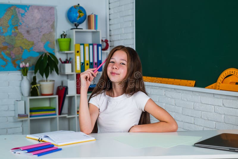 Cheerful Kid Girl Making Notes at School Lesson, Knowledge Stock Image ...