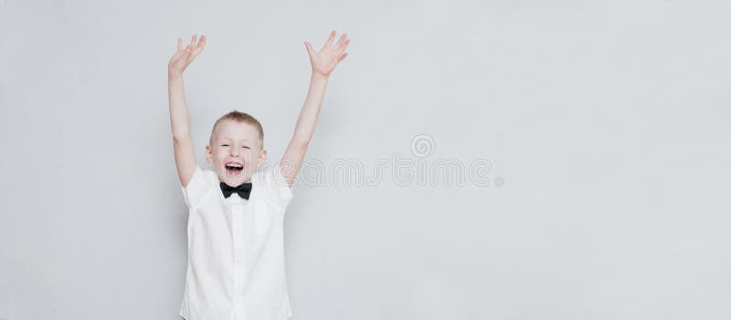 Cheerful kid with hands up stock image. Image of birthday - 92470579