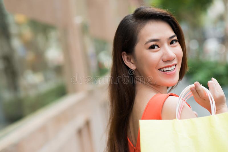Cheerful Lady in Glasses and Coat Posing with Joy Outside in the Snowy ...