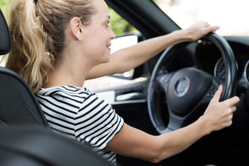 Cheerful lady driving car stock photo. Image of lady - 270024220
