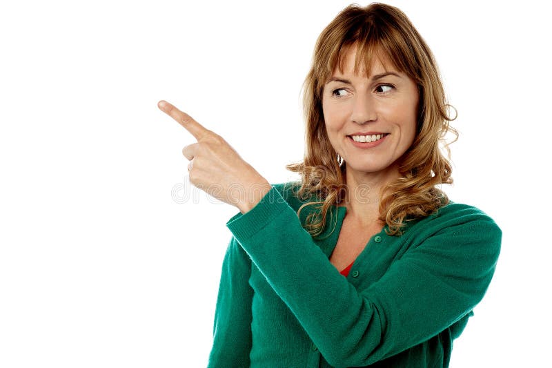 Cheerful Lady Pointing Away Stock Image - Image of middle, pointing ...