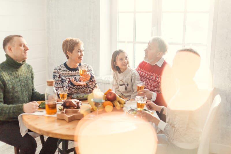 Cheerful Large Family Talking at the Table Stock Image - Image of ...