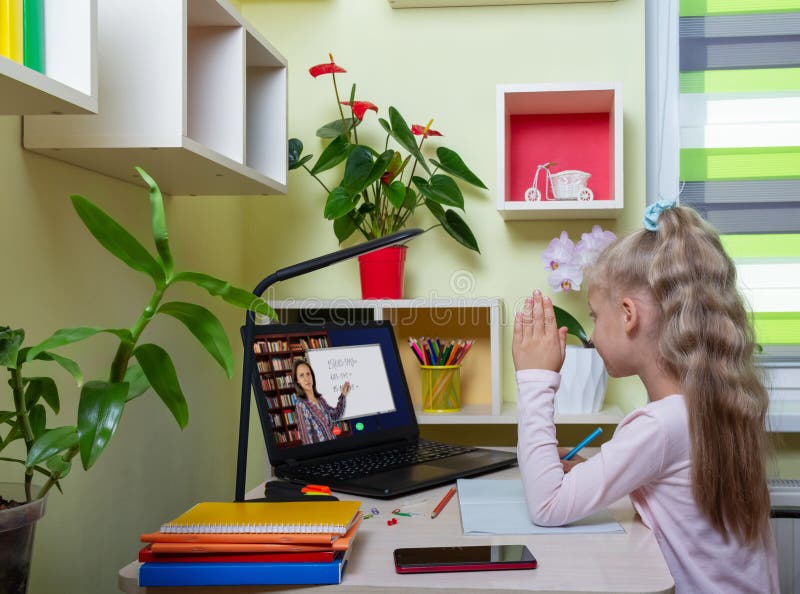 Cheerful Girl Using Laptop Computer Studying through Online E-learning ...
