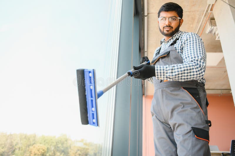Cheerful Male Person Cleaning Window Stock Image - Image of blue ...