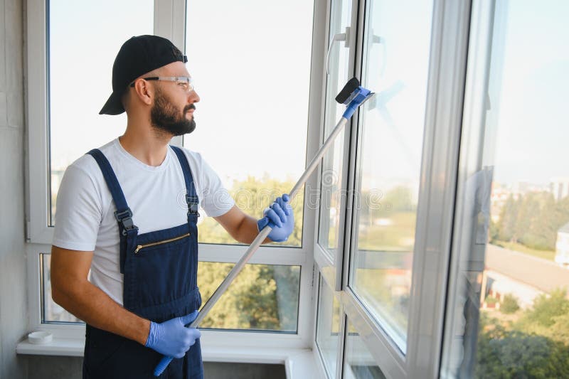 Cheerful Male Person Cleaning Window Stock Photo - Image of exterior ...