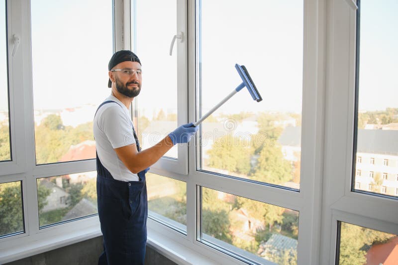 Cheerful Male Person Cleaning Window Stock Image - Image of ...