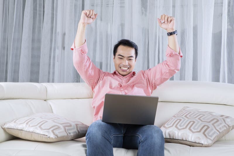 Cheerful Male Raising Hands with a Laptop Stock Image - Image of happy ...