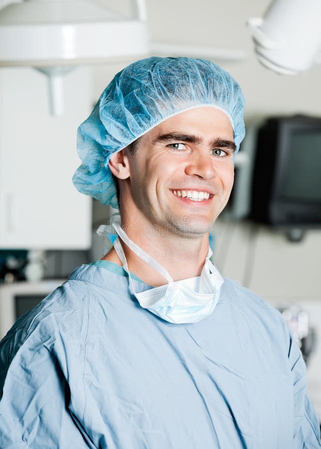 Cheerful Male Surgeon in Operating Room Stock Photo - Image of ...