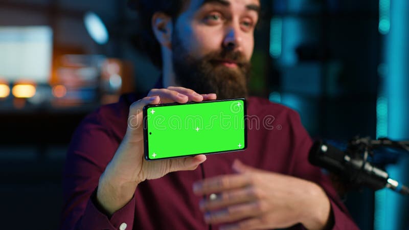 Cheerful Man Assessing Mockup Smartphone Performance Stock Footage ...