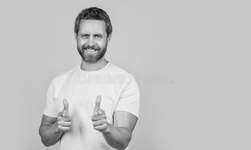Cheerful Man Offering Advertisement in Studio, Copy Space. Photo of Man ...
